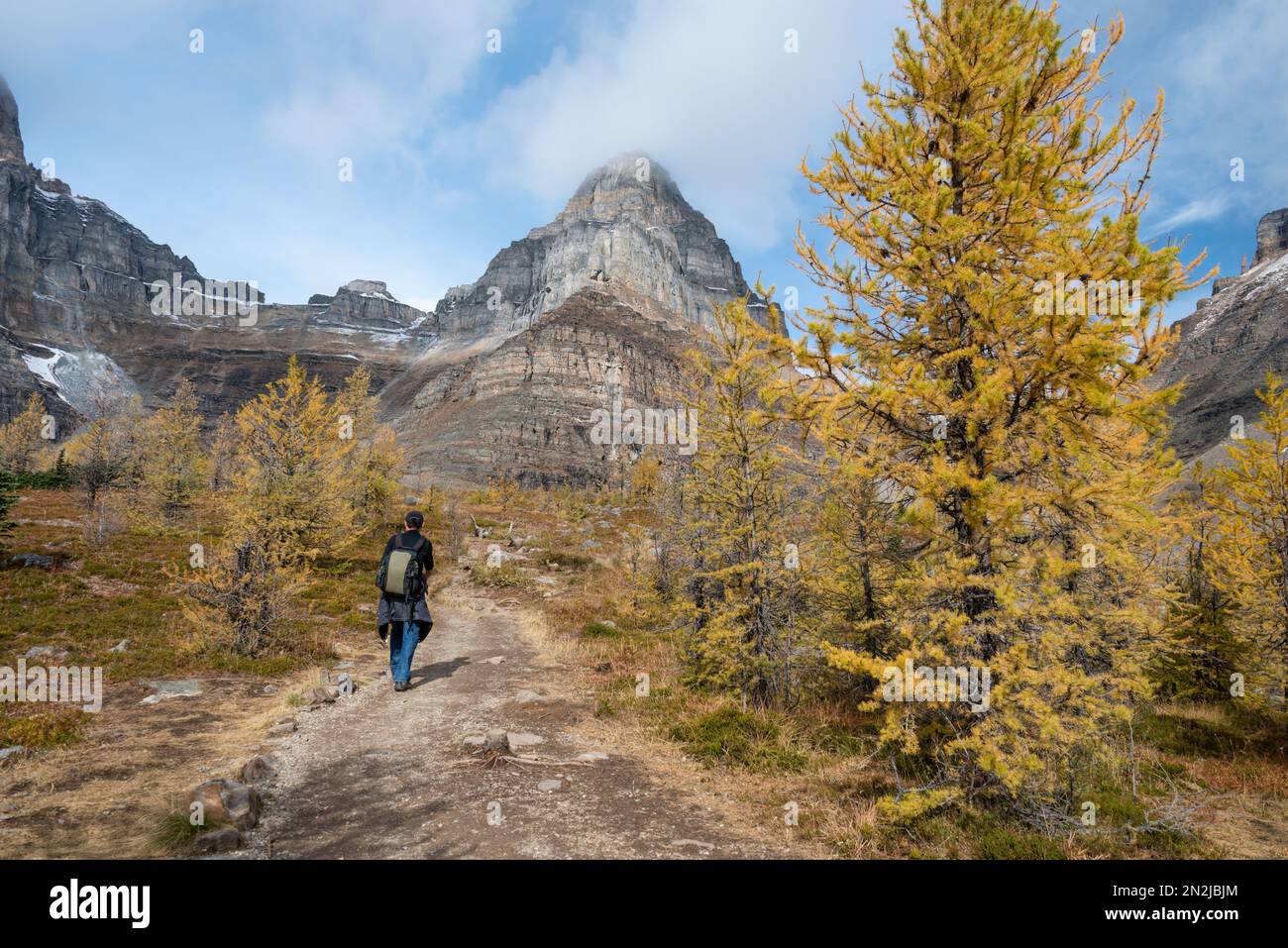 Hiking the Valley of Ten Peaks track in autumn, Banff national Park ...