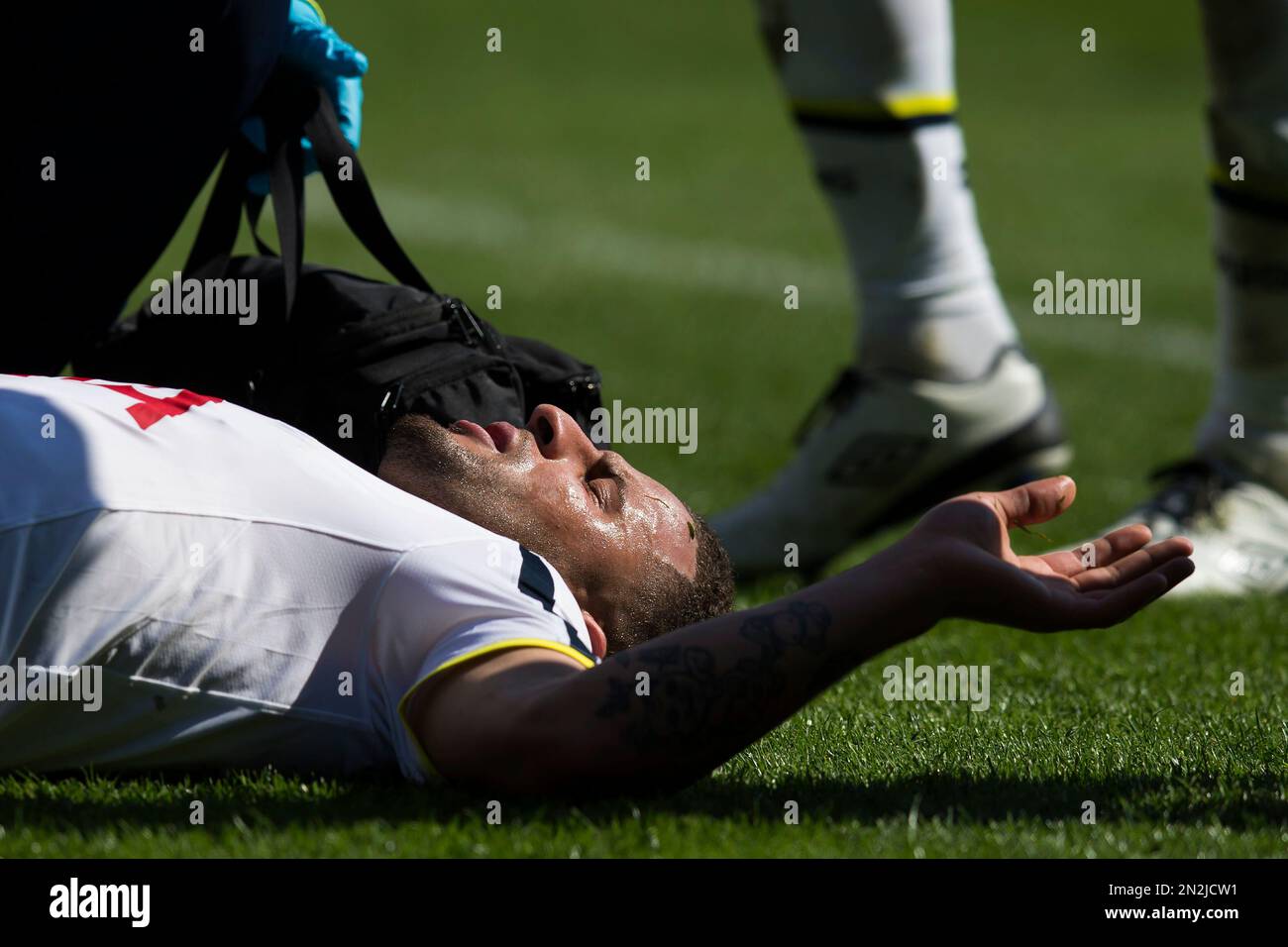Tottenham's Kyle Walker reacts after being injured during the English ...