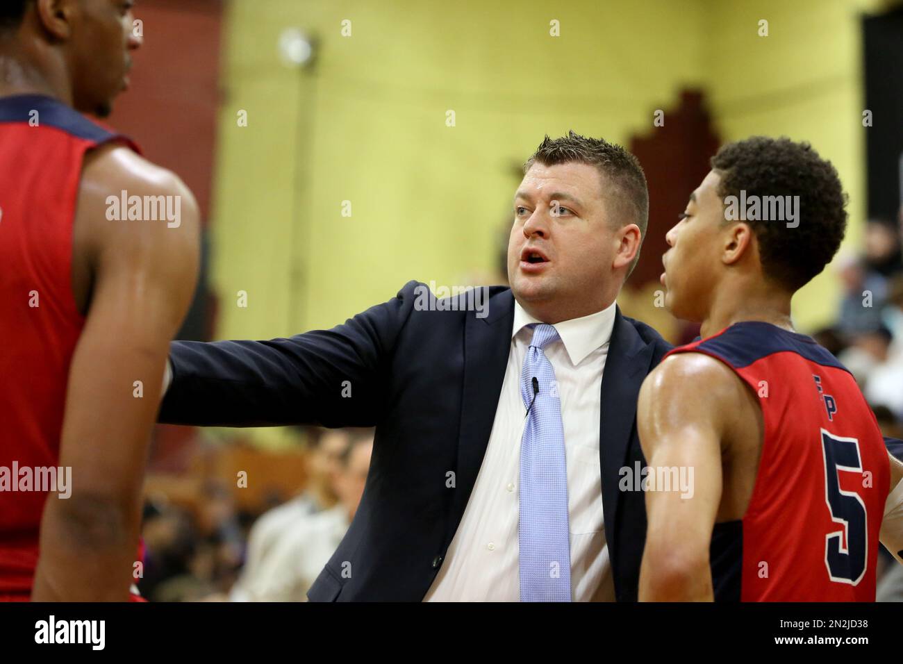 Findlay Prep head coach Andy Johnson talks with his team during a ...