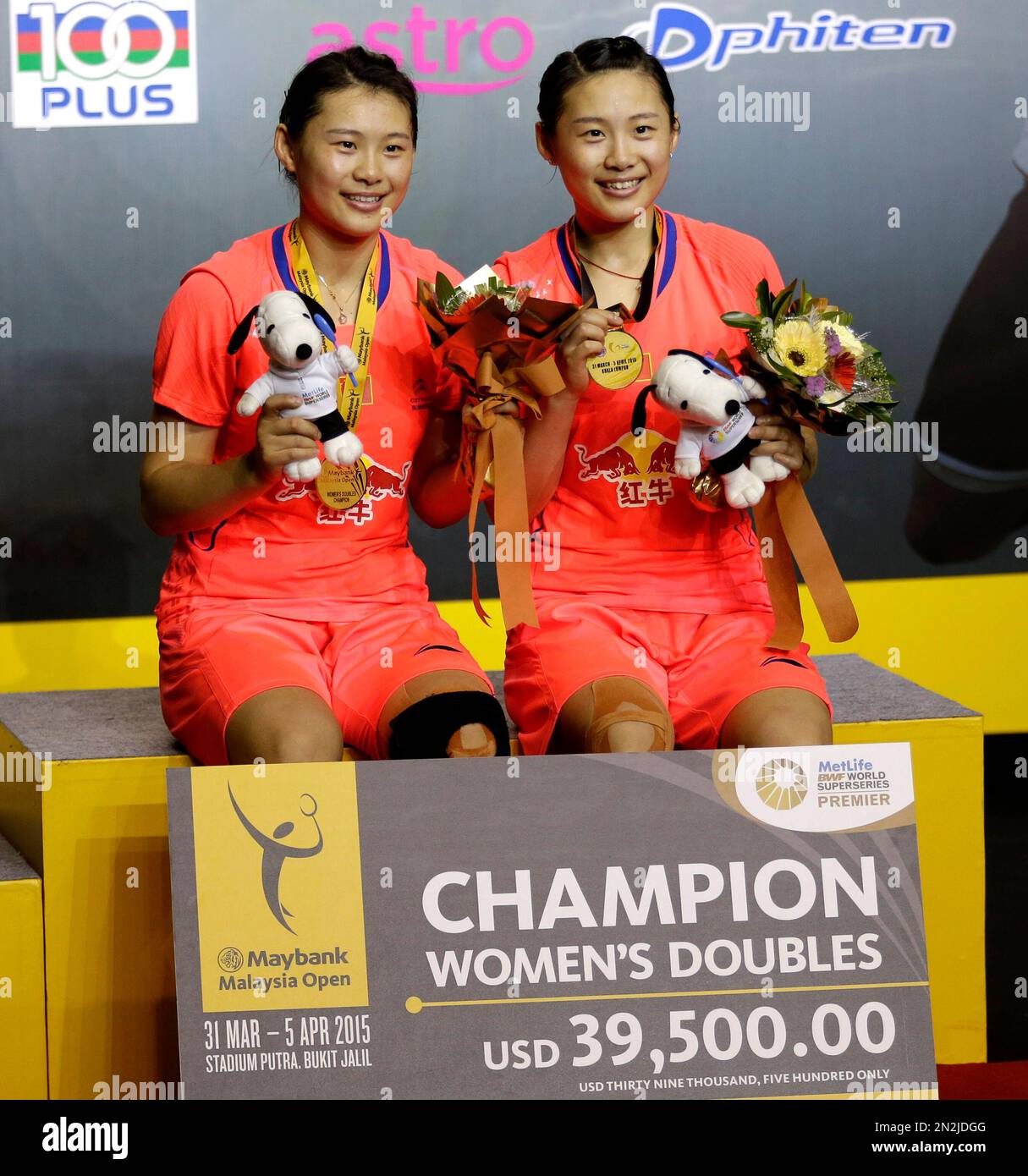 China's Luo Ying, left, and her twin sister Lou Yu pose with their ...