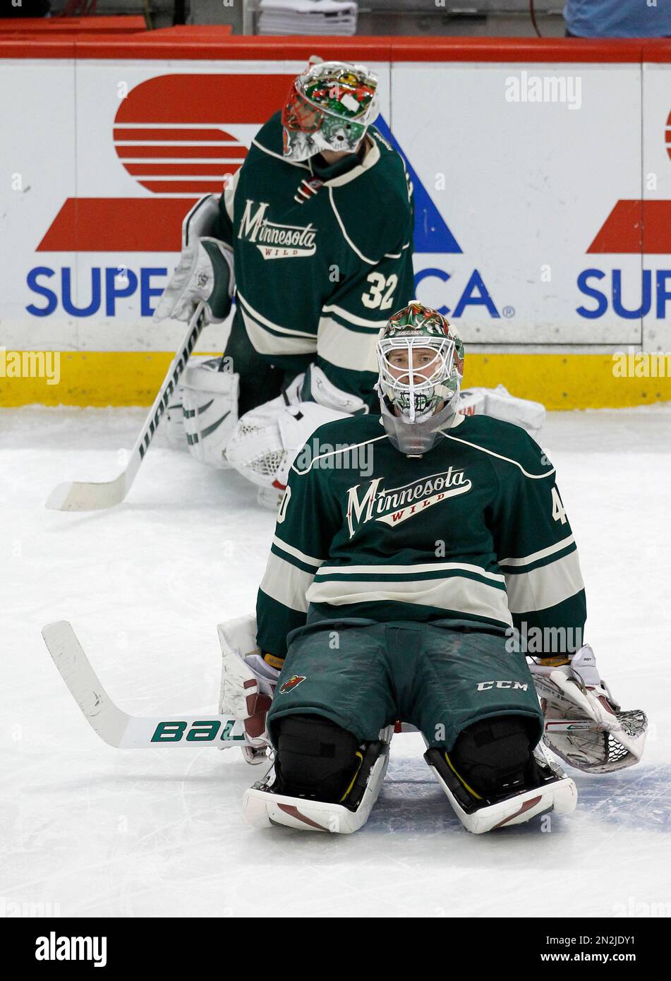 Minnesota Wild goalie Devan Dubnyk (40) and Minnesota Wild goalie ...