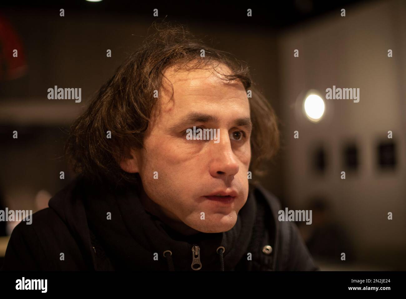 Bad hairstyle. Guy with disheveled hair. Sparse hair on head. Portrait ...