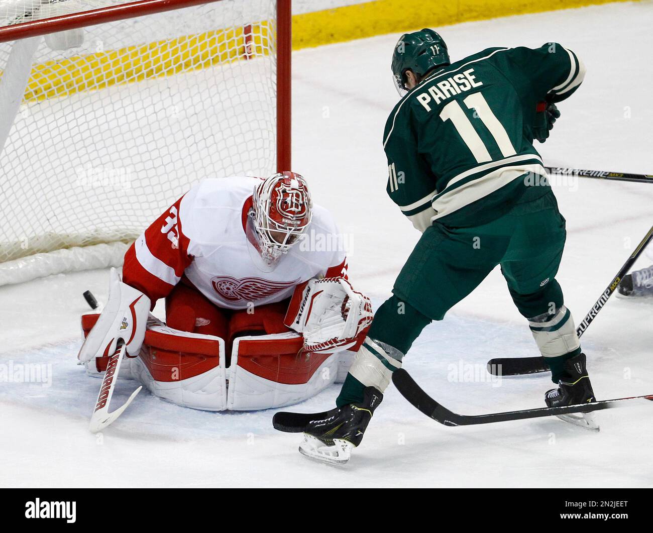 Minnesota Wild left wing Zach Parise (11) scores on Detroit Red Wings ...