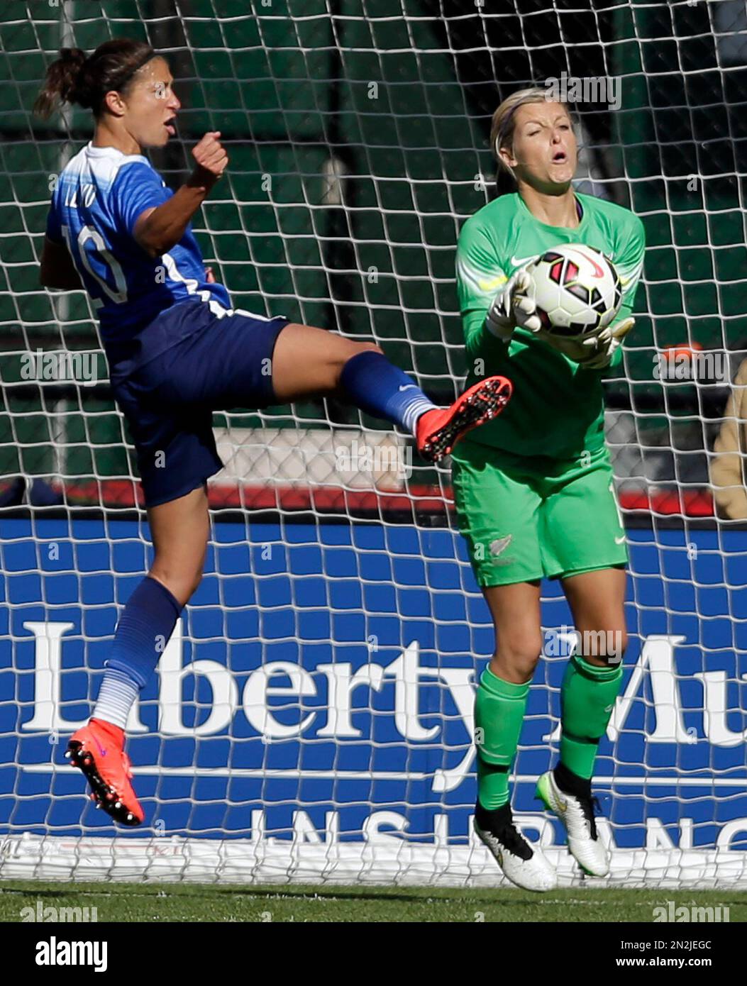 New Zealand goalkeeper Erin Nayler, right, stops a ball as United ...