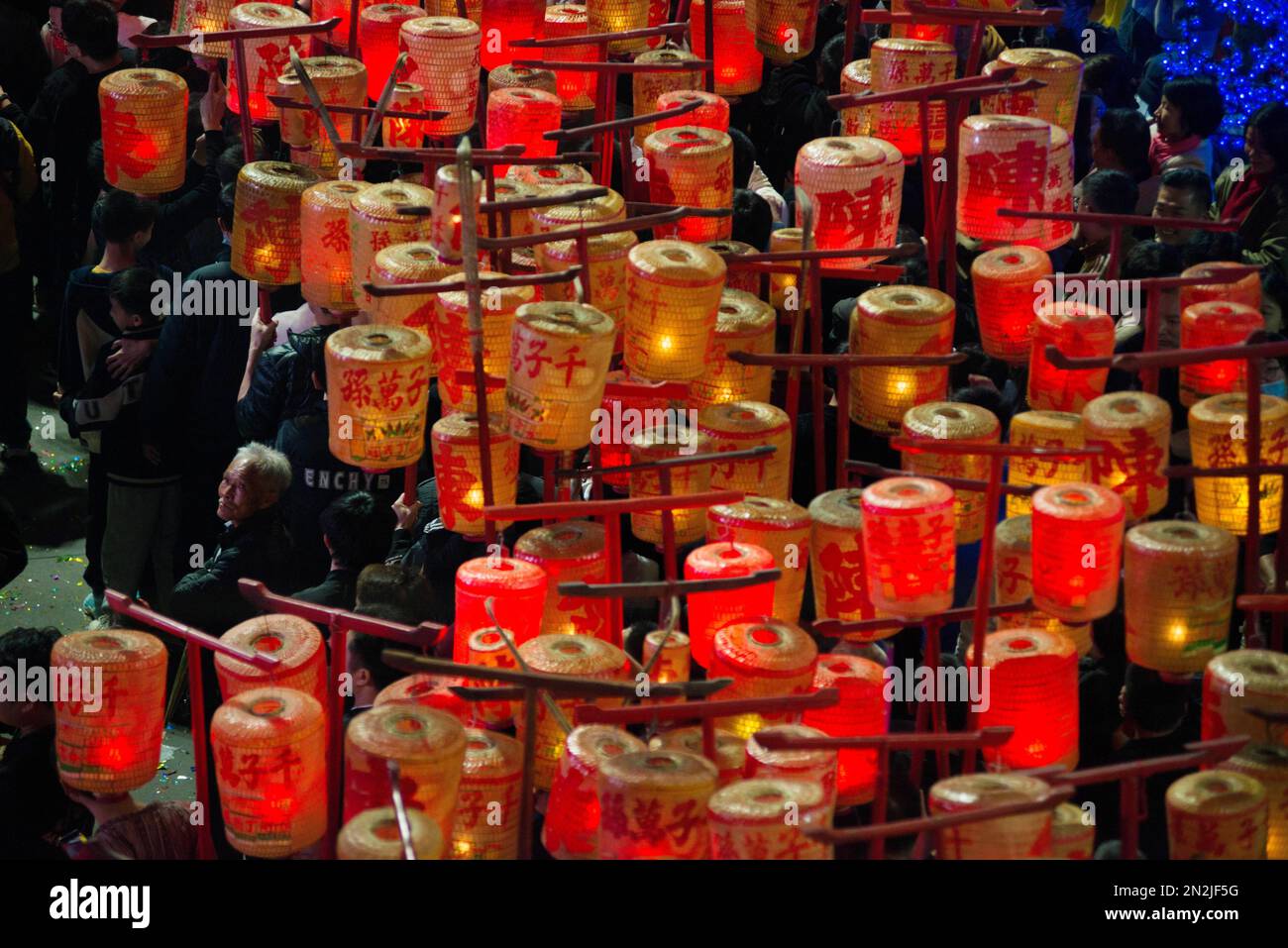 About ten thousand people take part in a lantern parade to celebrate ...