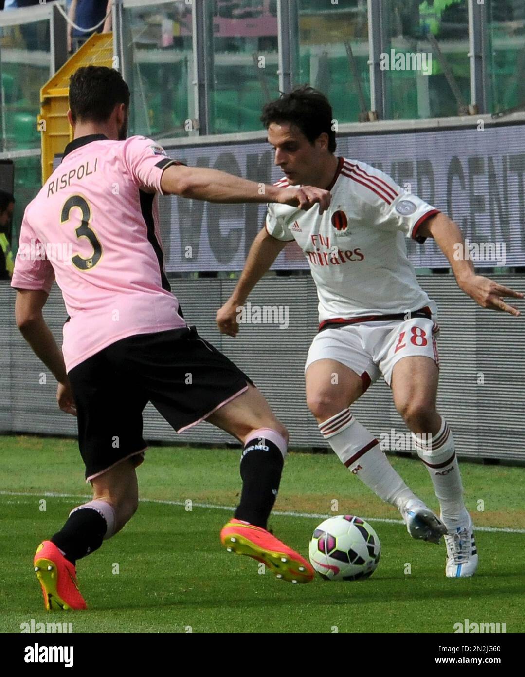 Milan's Giacomo Bonaventura, right, challenges for the ball with ...