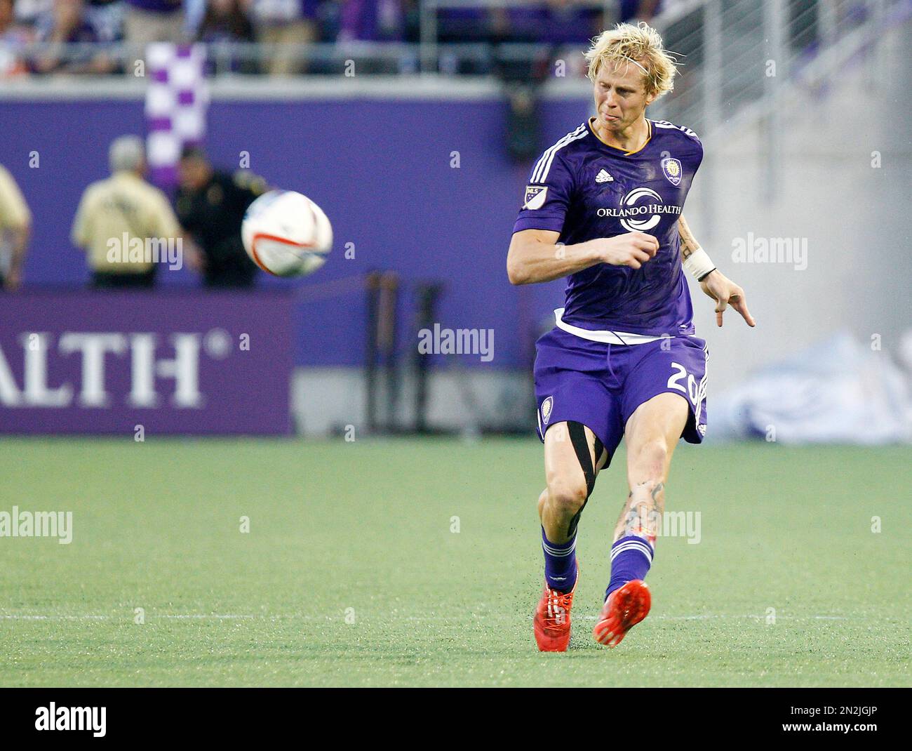 Orlando City FC defender Brek Shea (20) centers the ball during an MLS ...