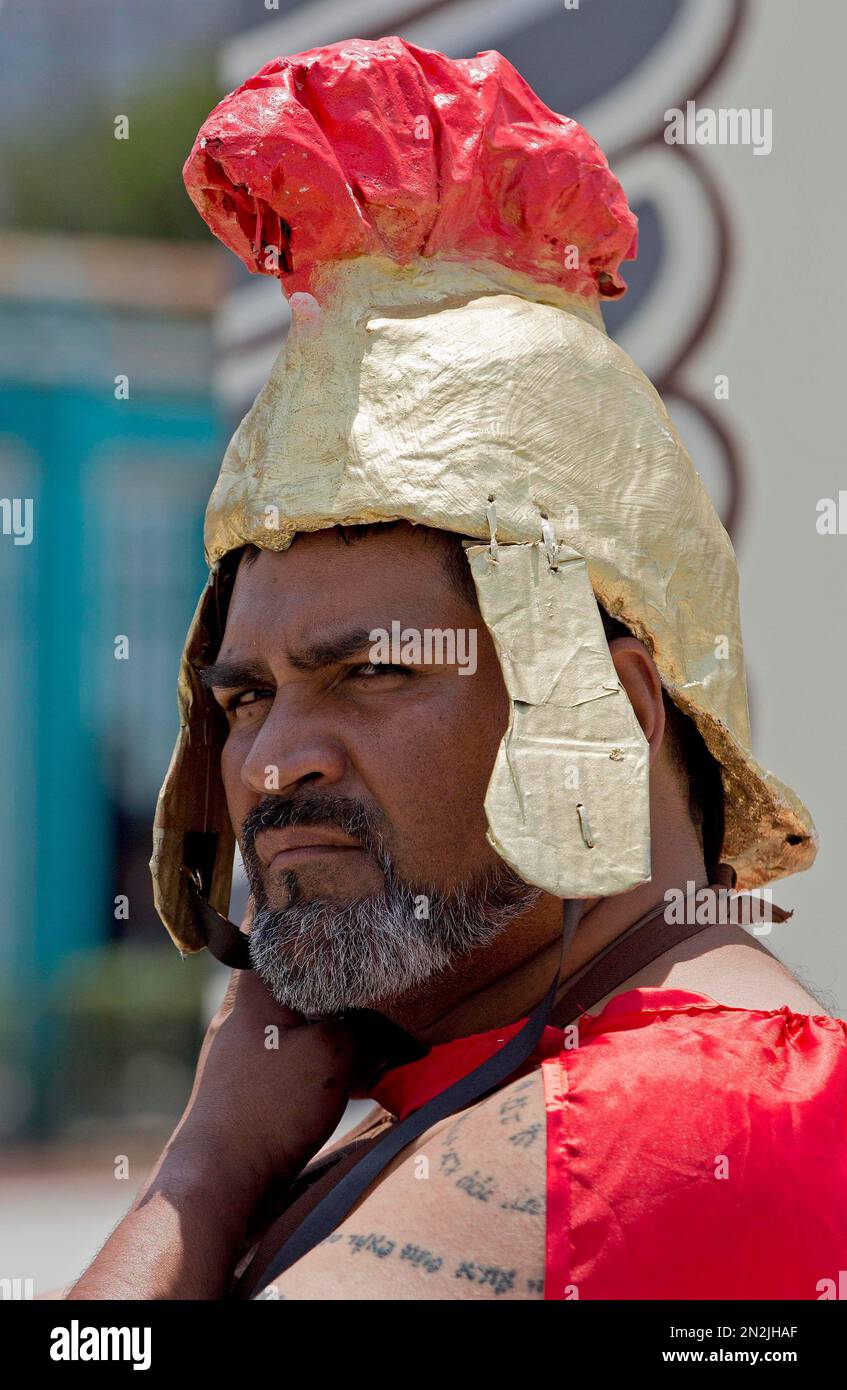 An inmate wears a handmade Roman soldier helmet, made out of cardboard ...