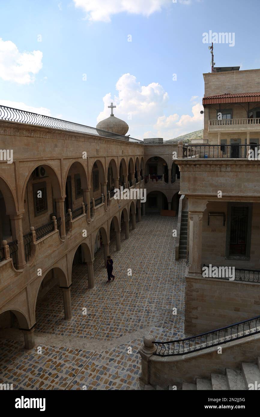 In this Thursday, April 2, 2015 photo, a man walks on the grounds of ...