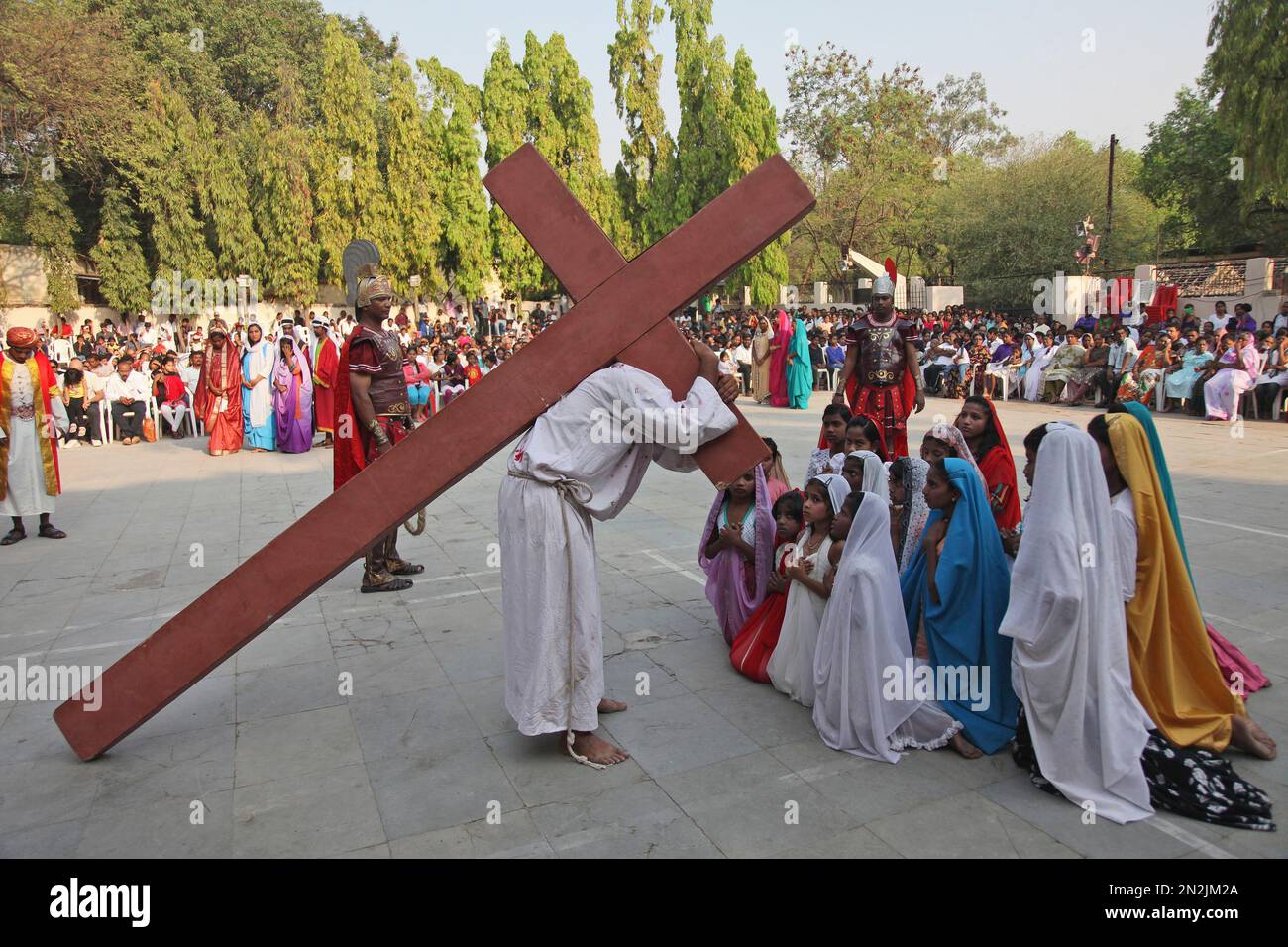 Indian Christian devotees enact the crucifixion of Jesus Christ to mark ...