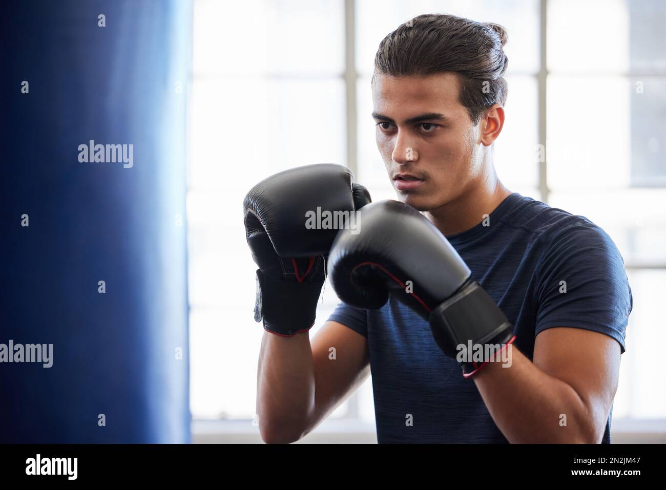 Man, boxing and fitness in gym exercise for power, performance and ...