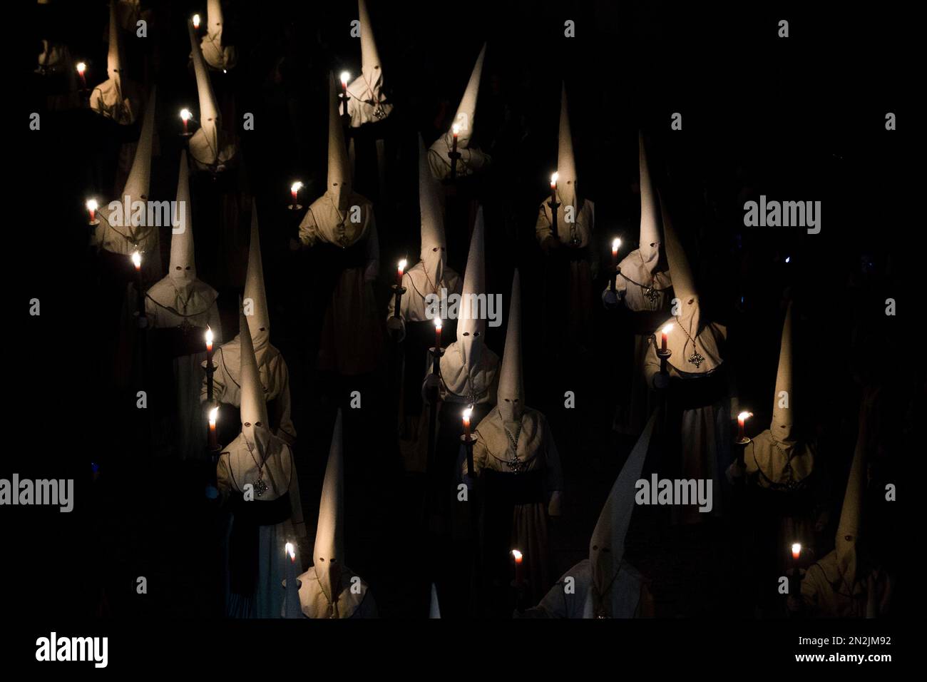 Penitents of the Jesus Yacente brotherhood take part in a Holy Week ...