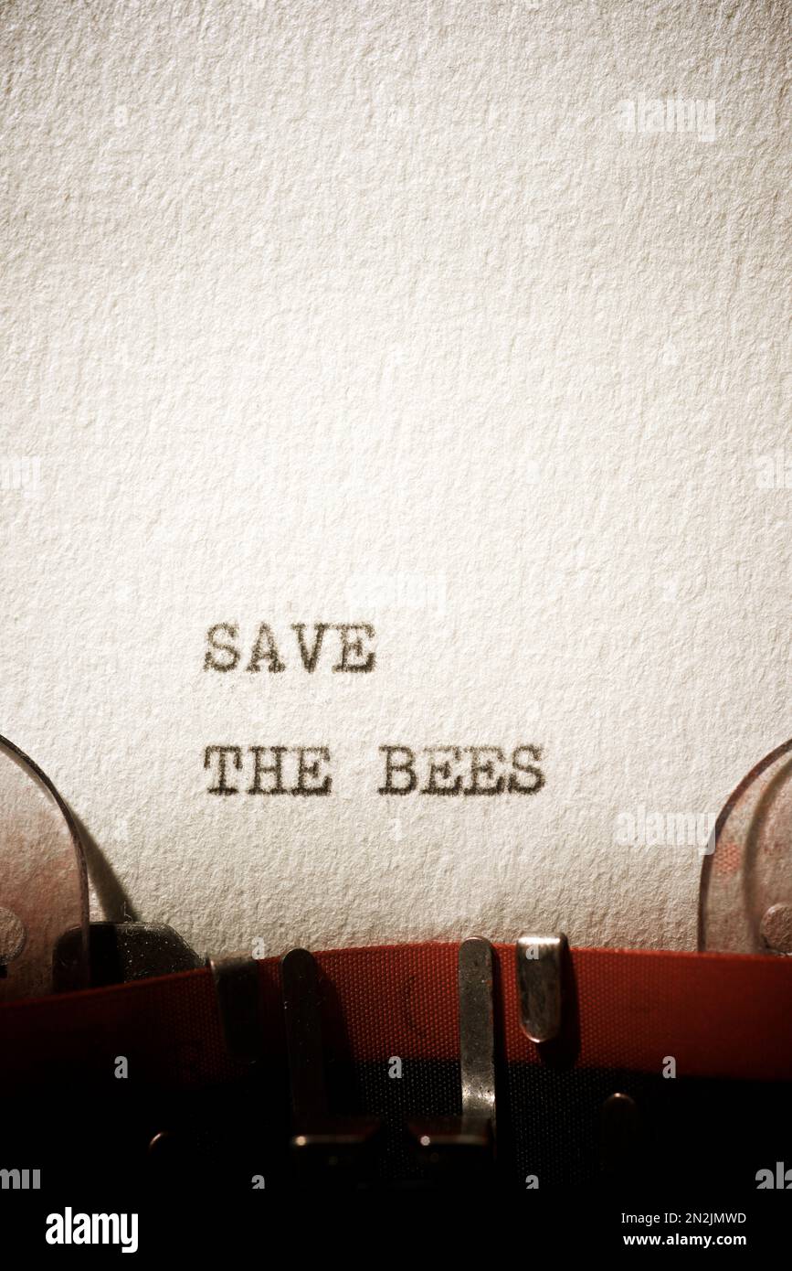 Save the bees text written with a typewriter Stock Photo - Alamy