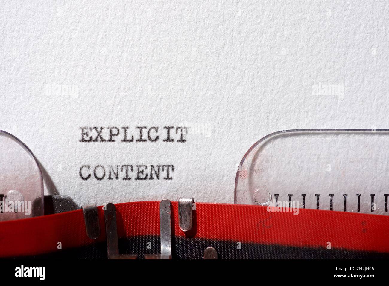 Explicit content text written with a typewriter Stock Photo - Alamy