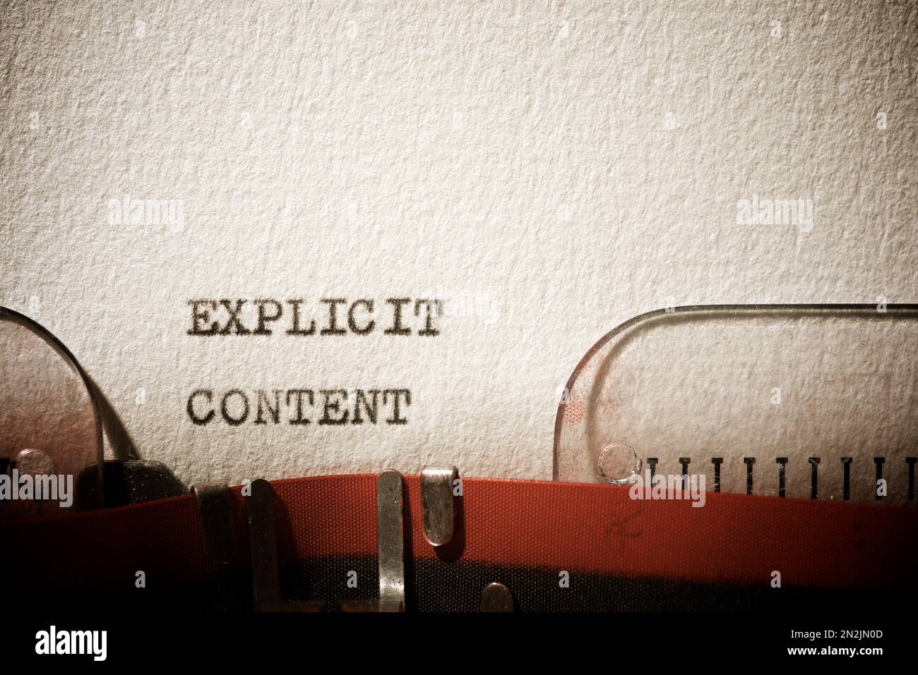 Explicit content text written with a typewriter Stock Photo - Alamy