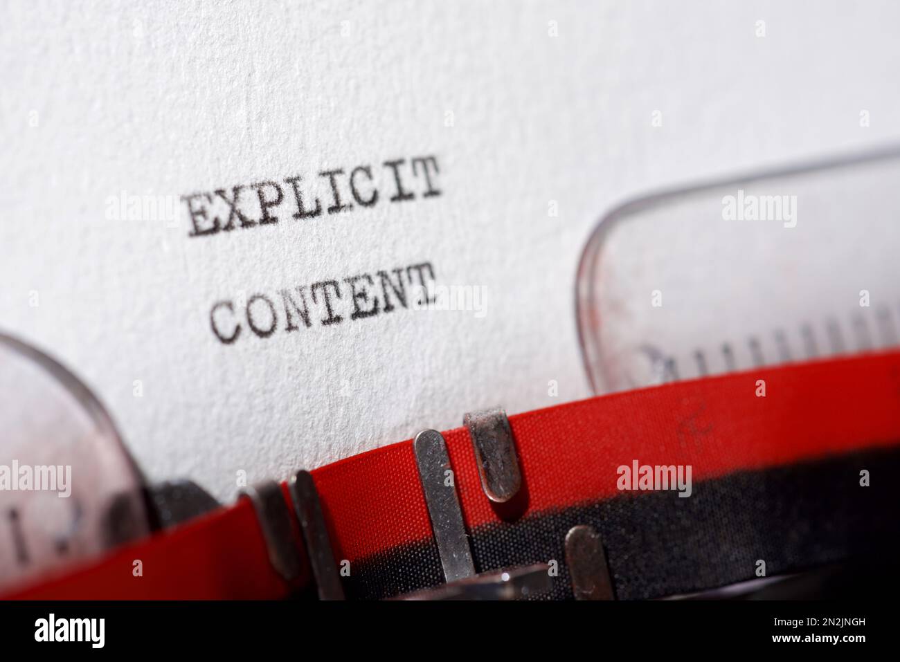Explicit content text written with a typewriter Stock Photo - Alamy