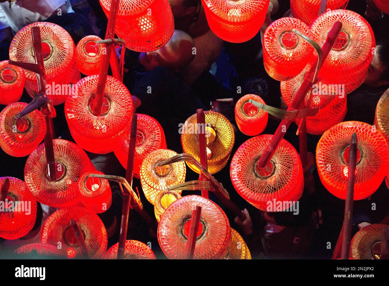 About ten thousand people take part in a lantern parade to celebrate ...