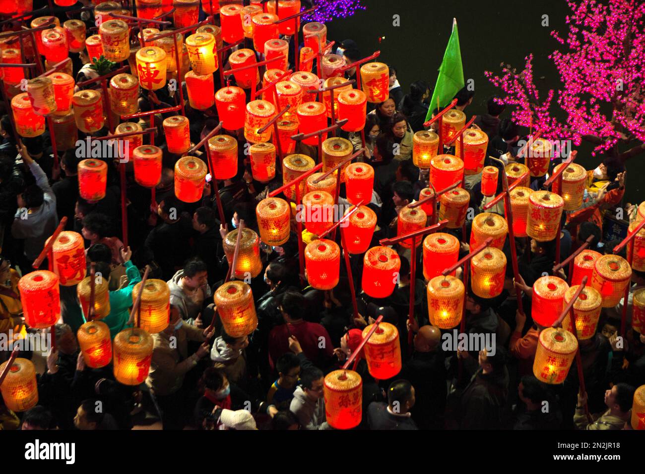 About ten thousand people take part in a lantern parade to celebrate ...
