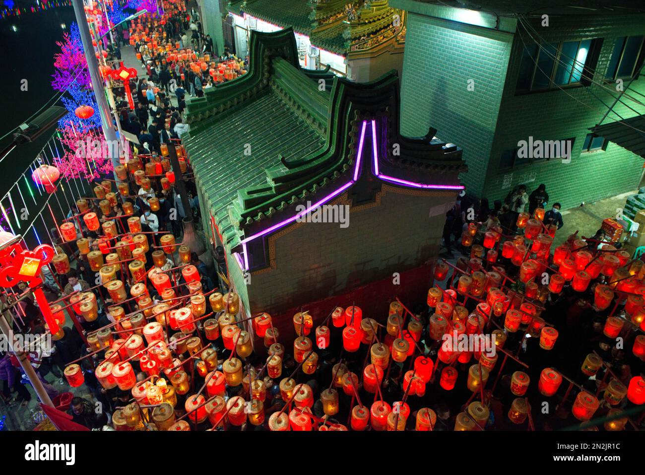 About ten thousand people take part in a lantern parade to celebrate ...