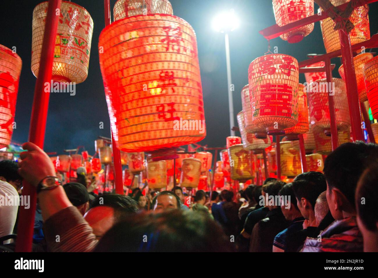 About ten thousand people take part in a lantern parade to celebrate ...