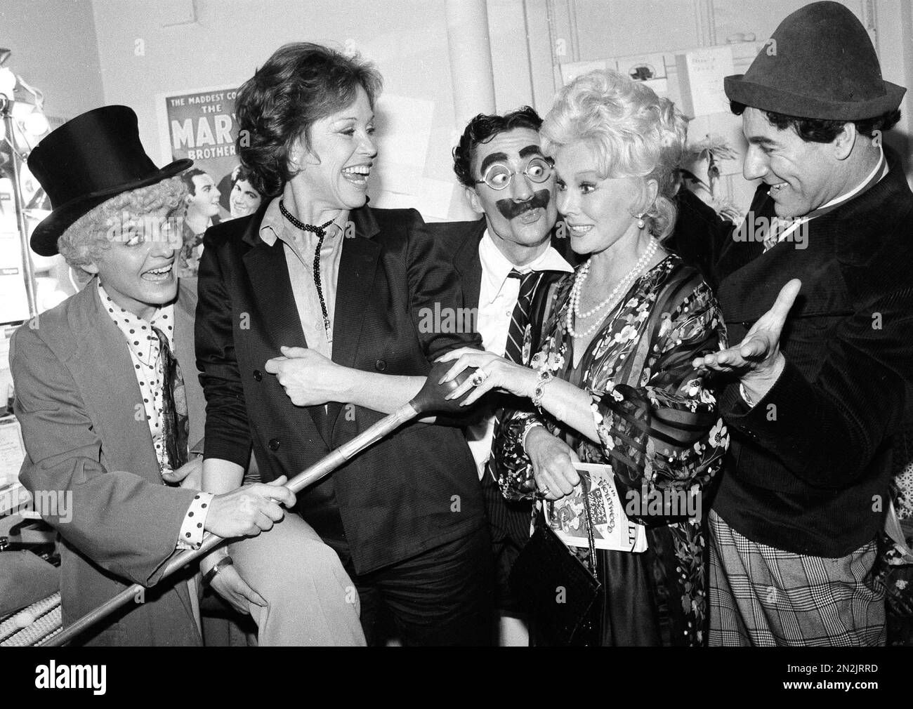 Mary Tyler Moore, second from left, and Eva Gabor, second from right ...