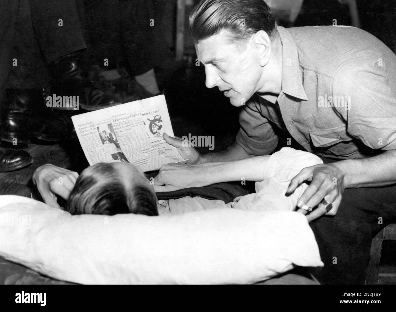 Otto Skorzeny and his co-defendent Philip von Behr, lying on the ...