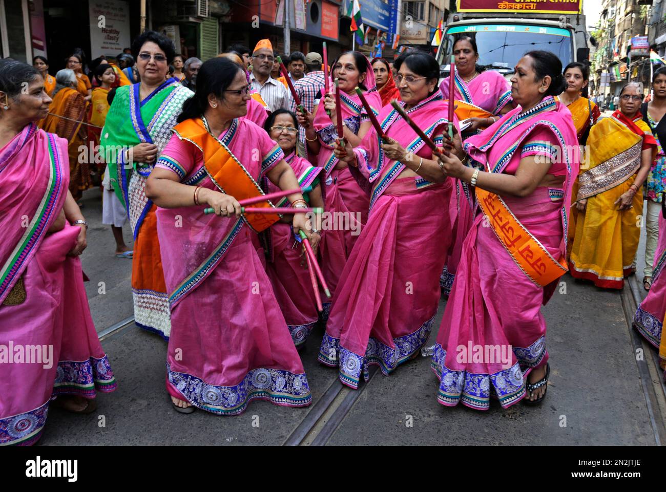Indian women belonging to the Jain community perform a traditional ...