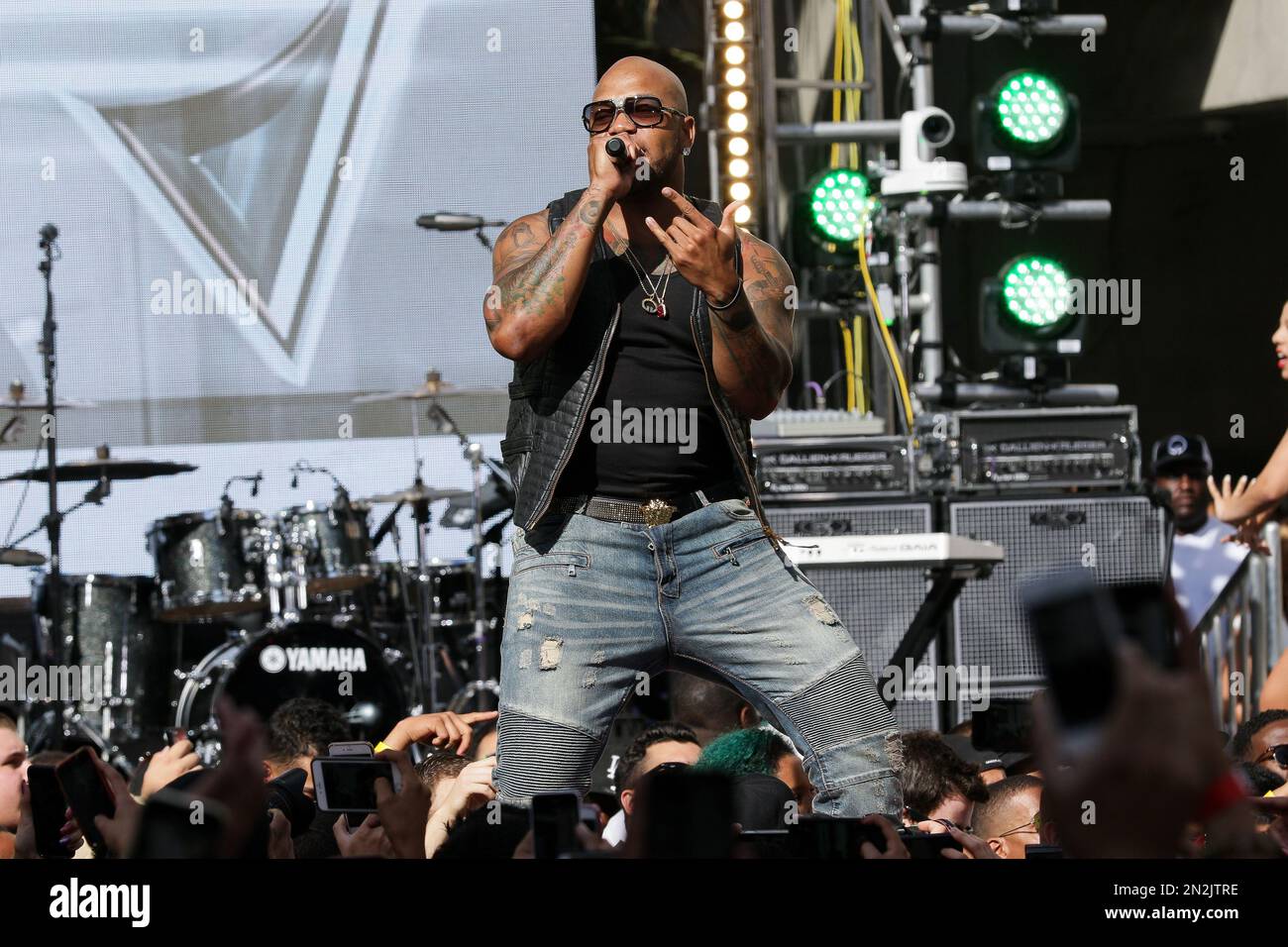 Flo Rida performs on stage at the "Furious 7" Takeover held at the ...