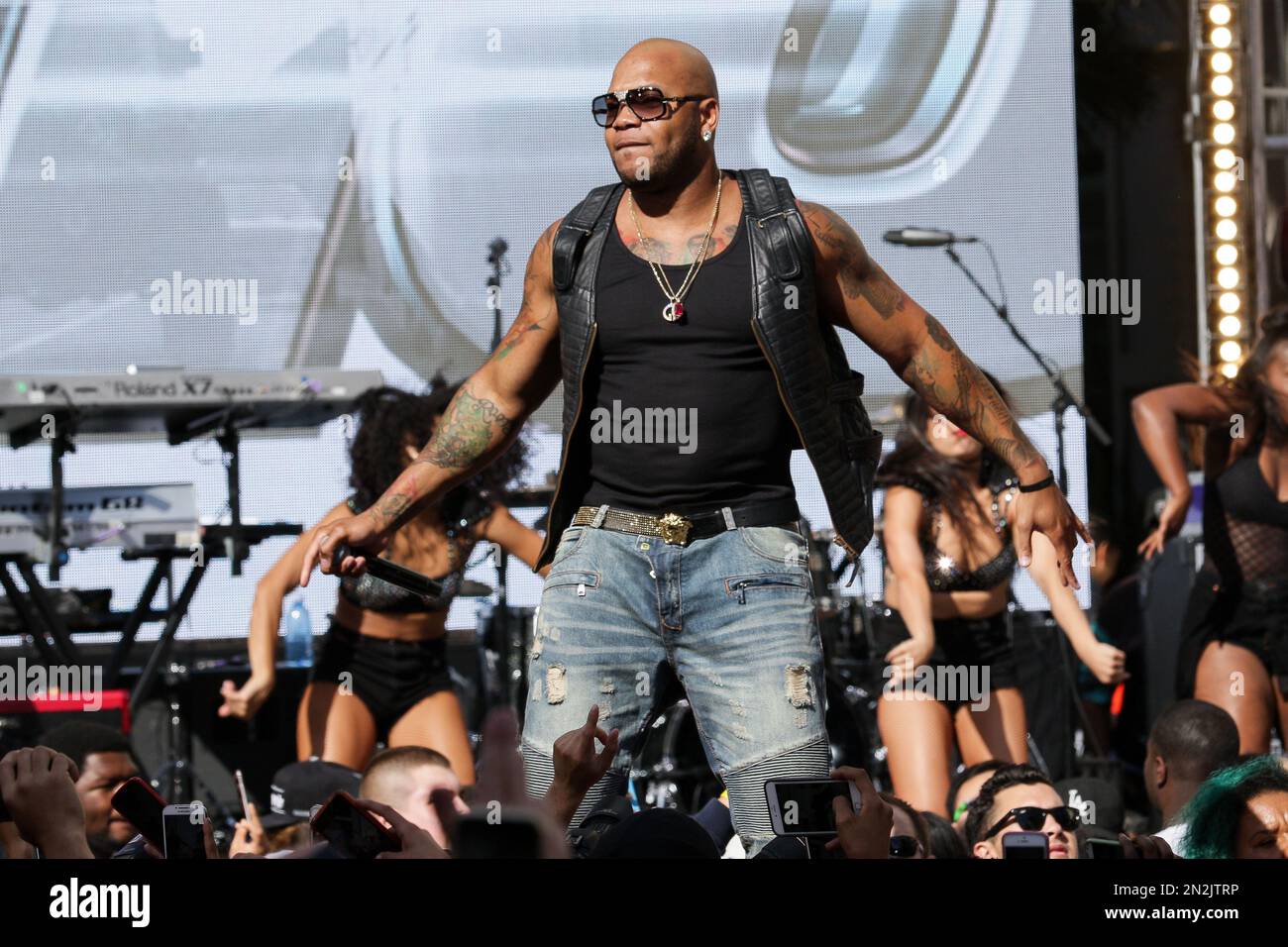 Flo Rida performs on stage at the "Furious 7" Takeover held at the ...