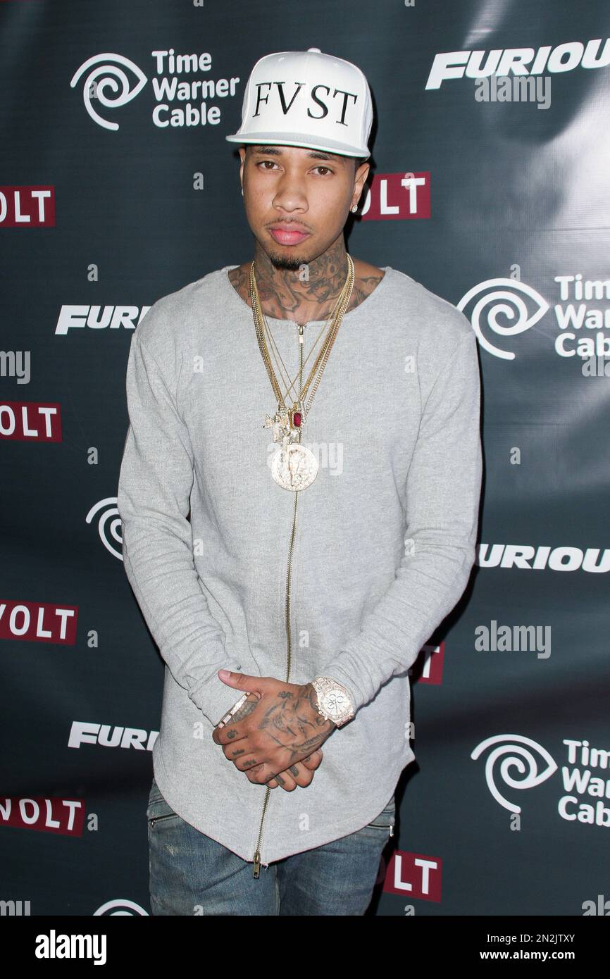 Tyga arrives at the "Furious 7" Takeover held at the Revolt Live ...