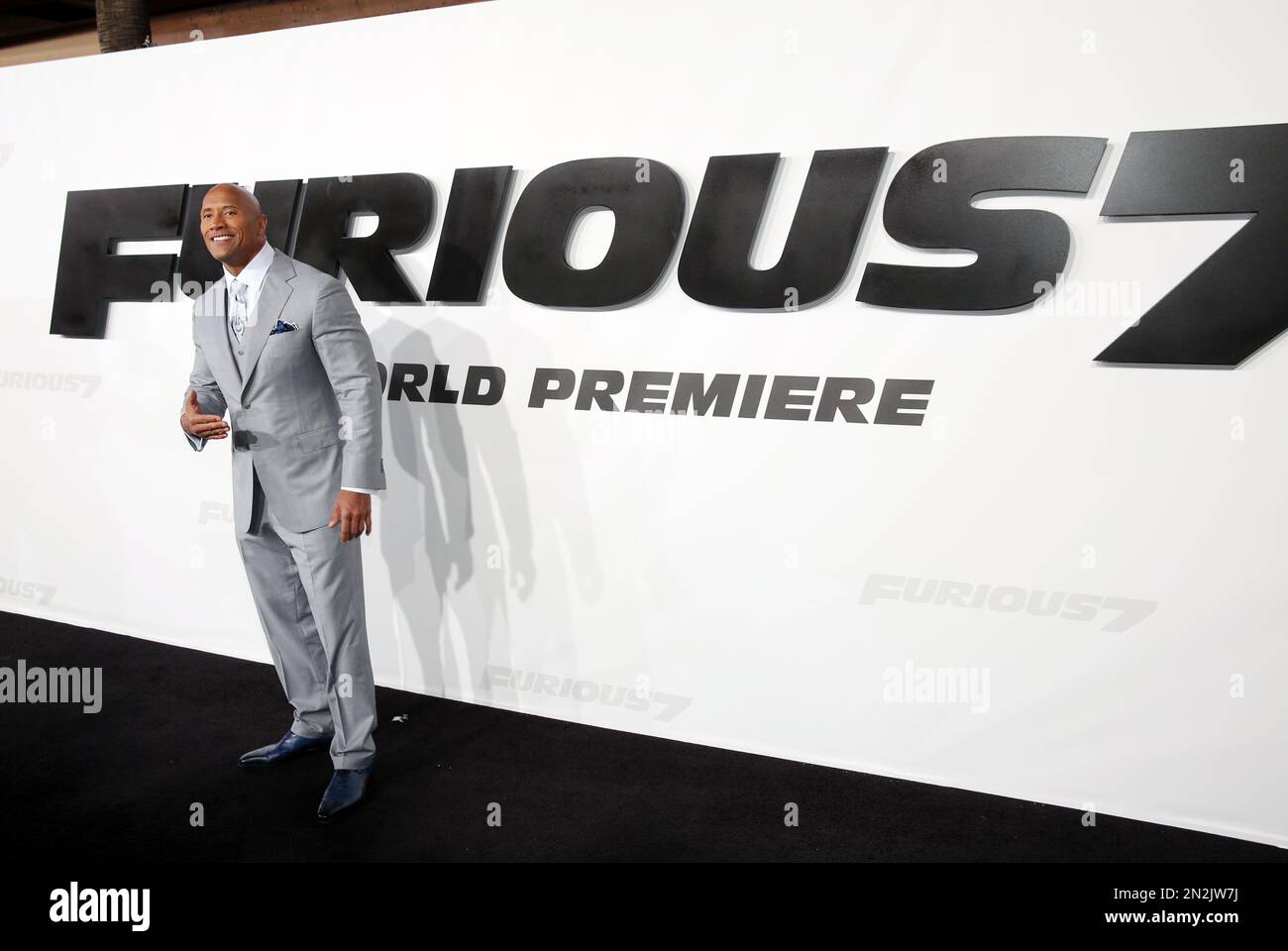 Dwayne "The Rock" Johnson arrives at the premiere of "Furious 7" at the ...