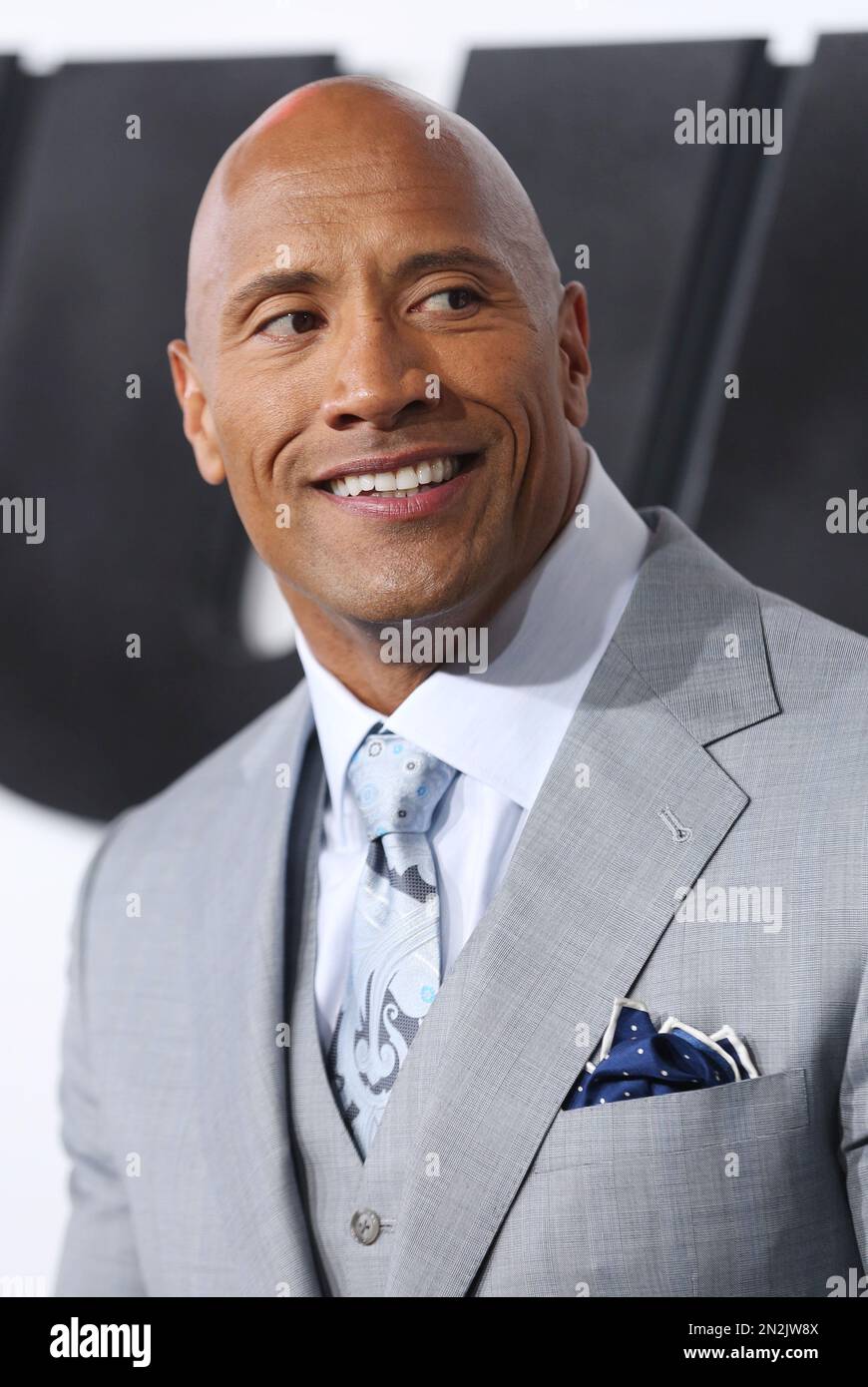 Dwayne "The Rock" Johnson arrives at the premiere of "Furious 7" at the ...