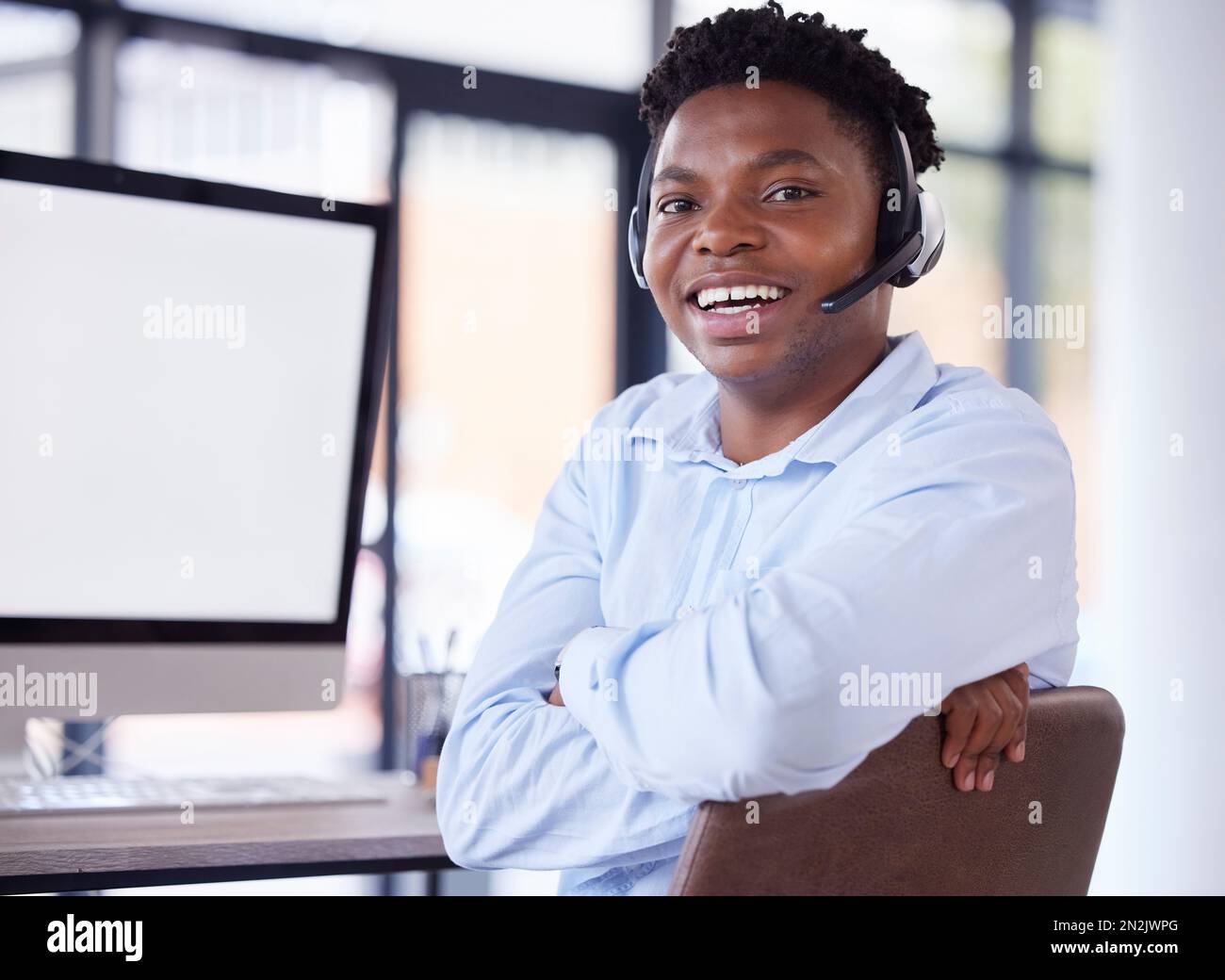 Customer service, happy portrait and black man in call center with ...