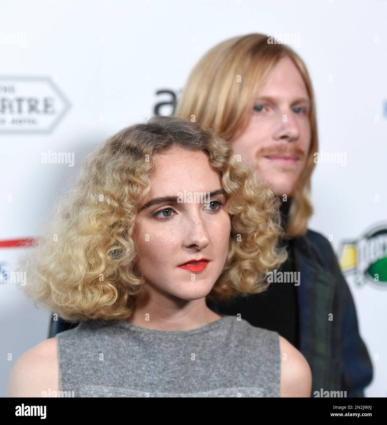 Alaina Moore, left, and Patrick Riley, of Tennis, attend the David ...