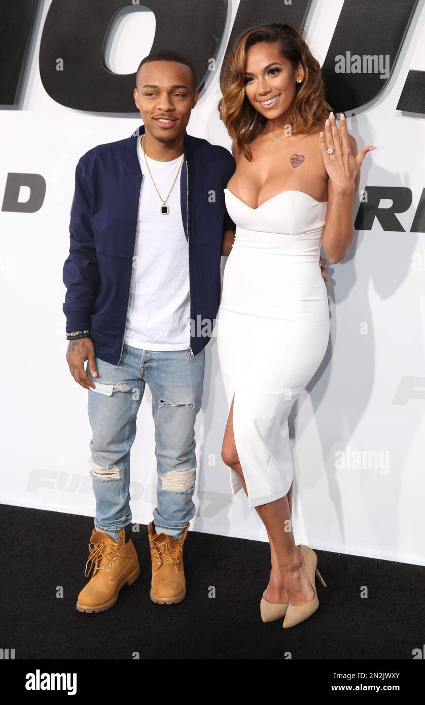Shad Moss, left, and Erica Mena arrive at the premiere of "Furious 7 ...