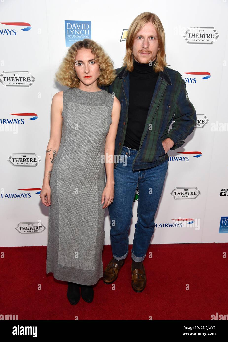 Alaina Moore, left, and Patrick Riley, of Tennis, attend the David ...