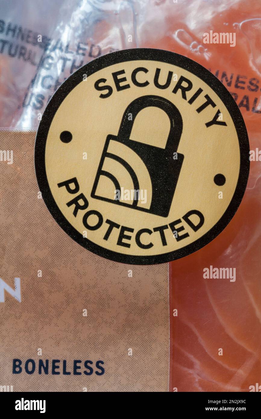 Security protected label sticker on packet of salmon from M&S Stock ...