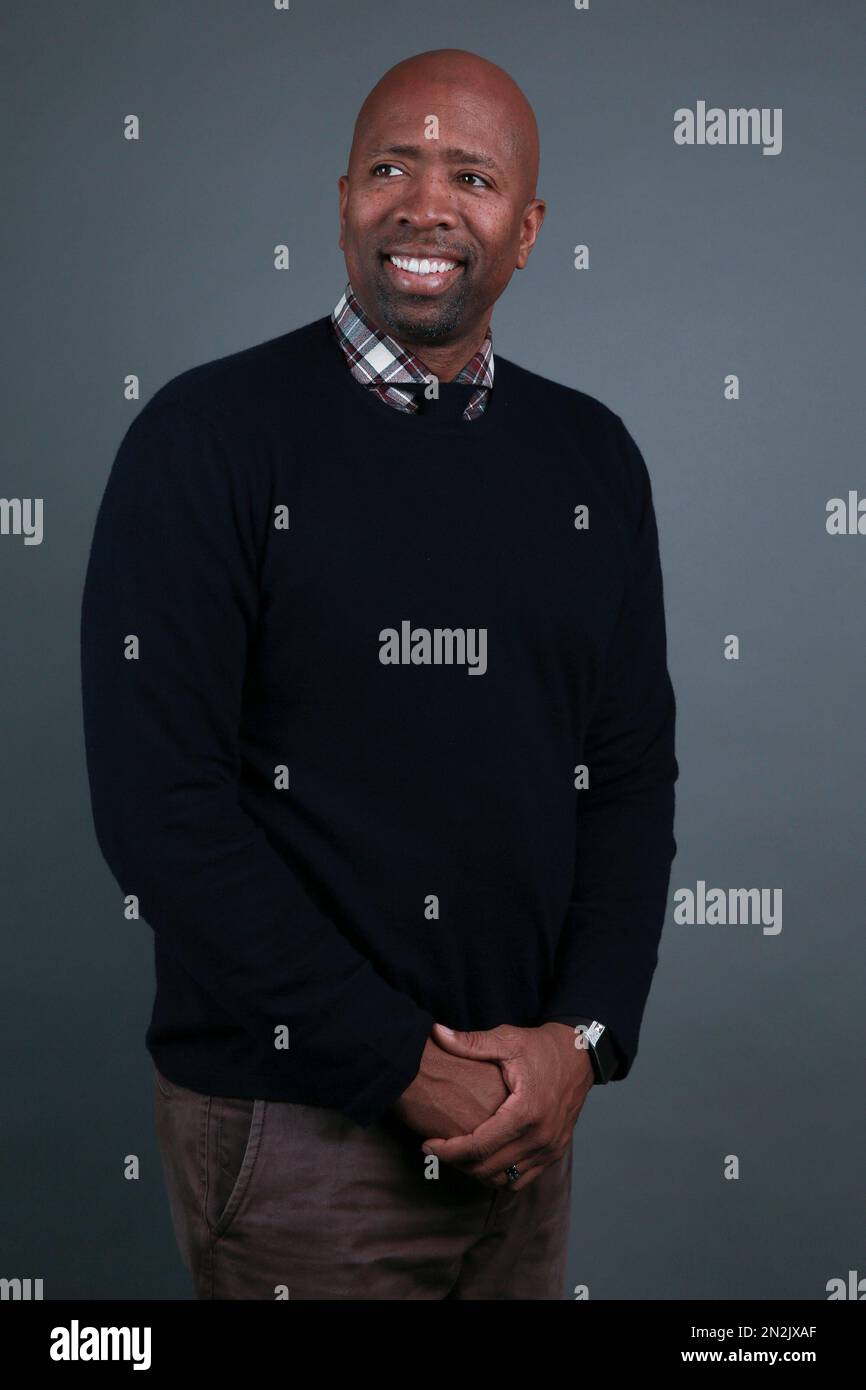 Former NBA Star Kenny Smith and wife Gwendolyn Osborne-Smith pose for a ...