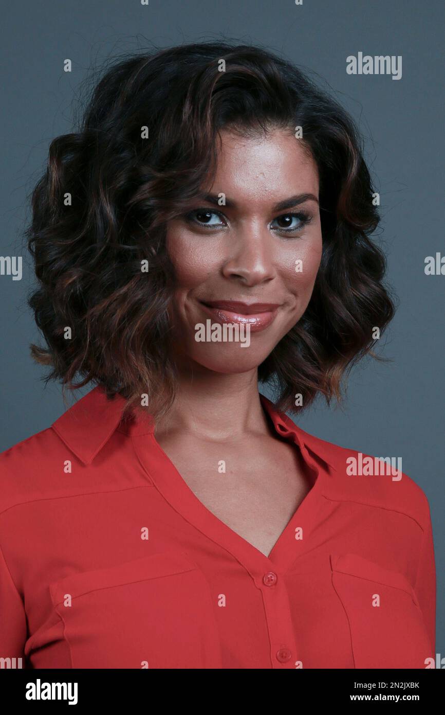 Former NBA Star Kenny Smith and wife Gwendolyn Osborne-Smith pose for a ...