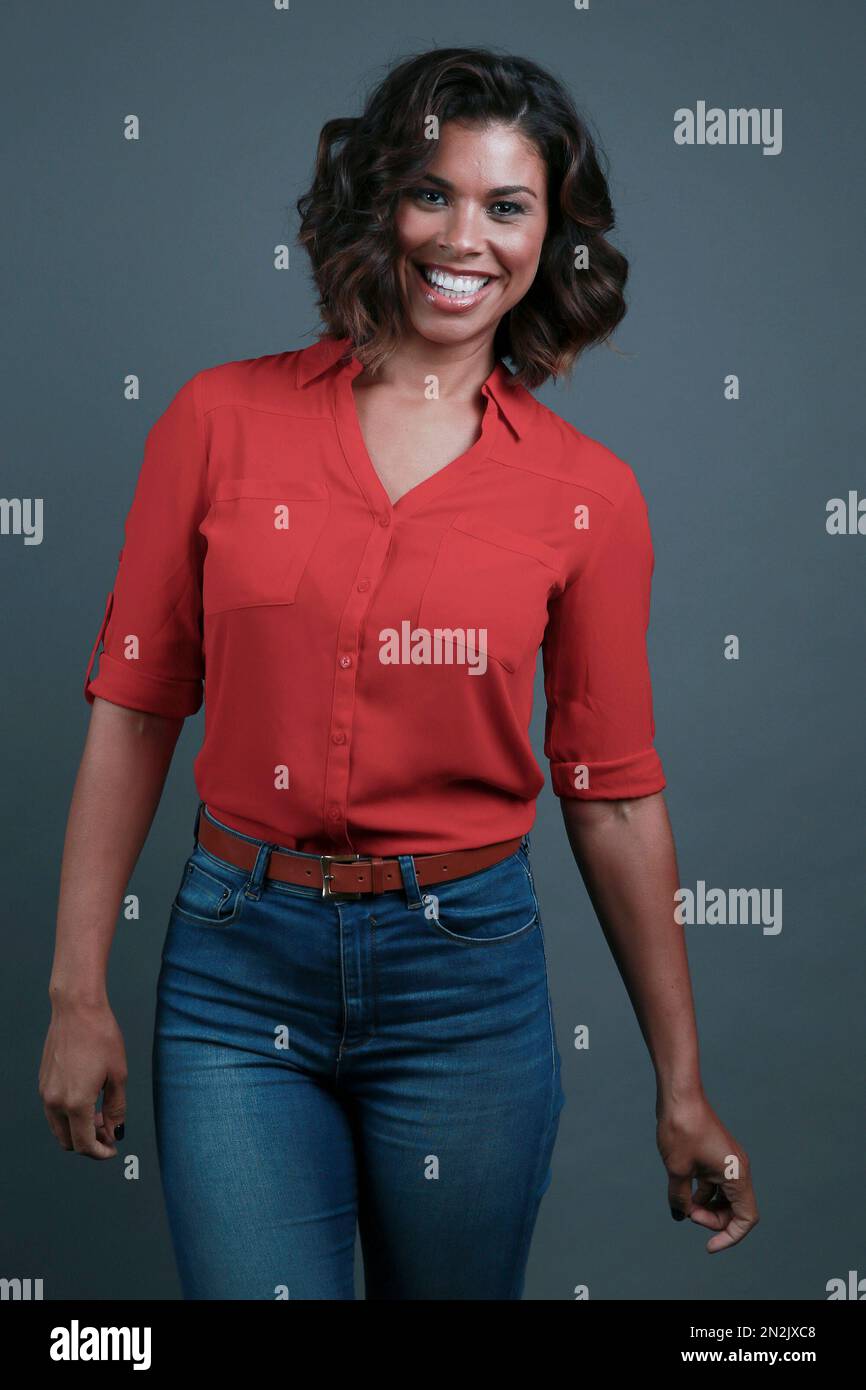 Former NBA Star Kenny Smith and wife Gwendolyn Osborne-Smith pose for a ...