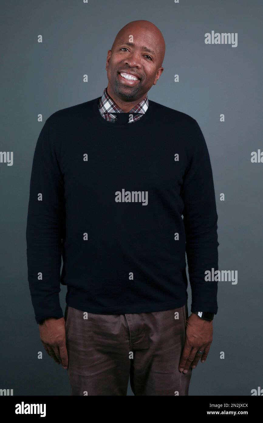 Former NBA Star Kenny Smith and wife Gwendolyn Osborne-Smith pose for a ...