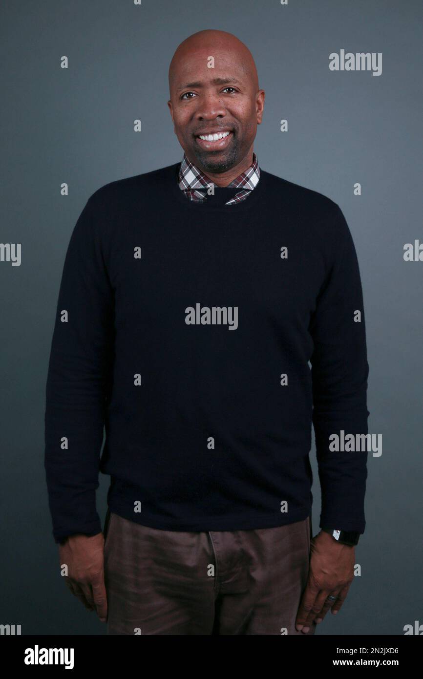 Former NBA Star Kenny Smith and wife Gwendolyn Osborne-Smith pose for a ...