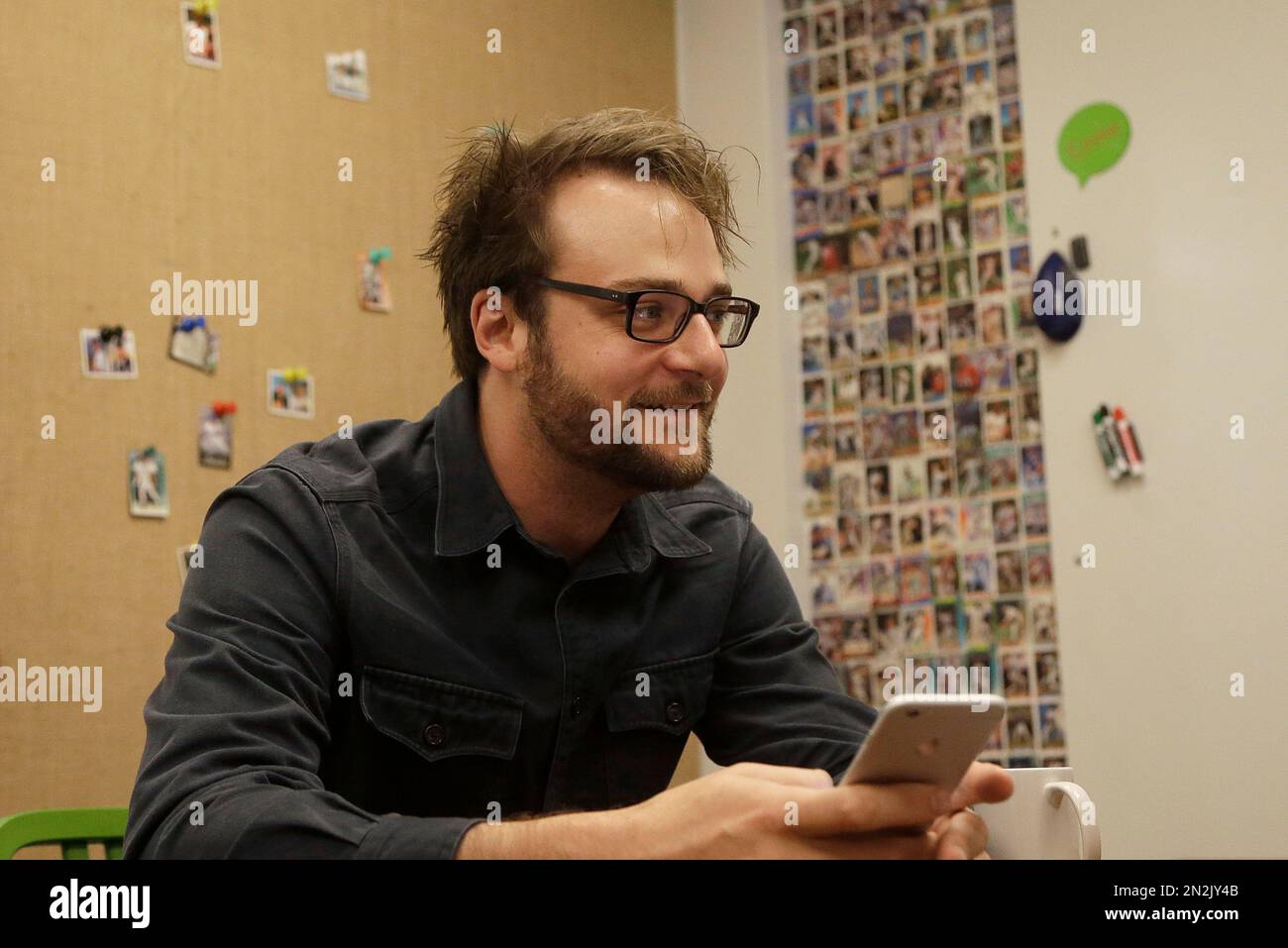 In this Nov. 13, 2014 photo, Pinterest co-founder Evan Sharp smiles ...