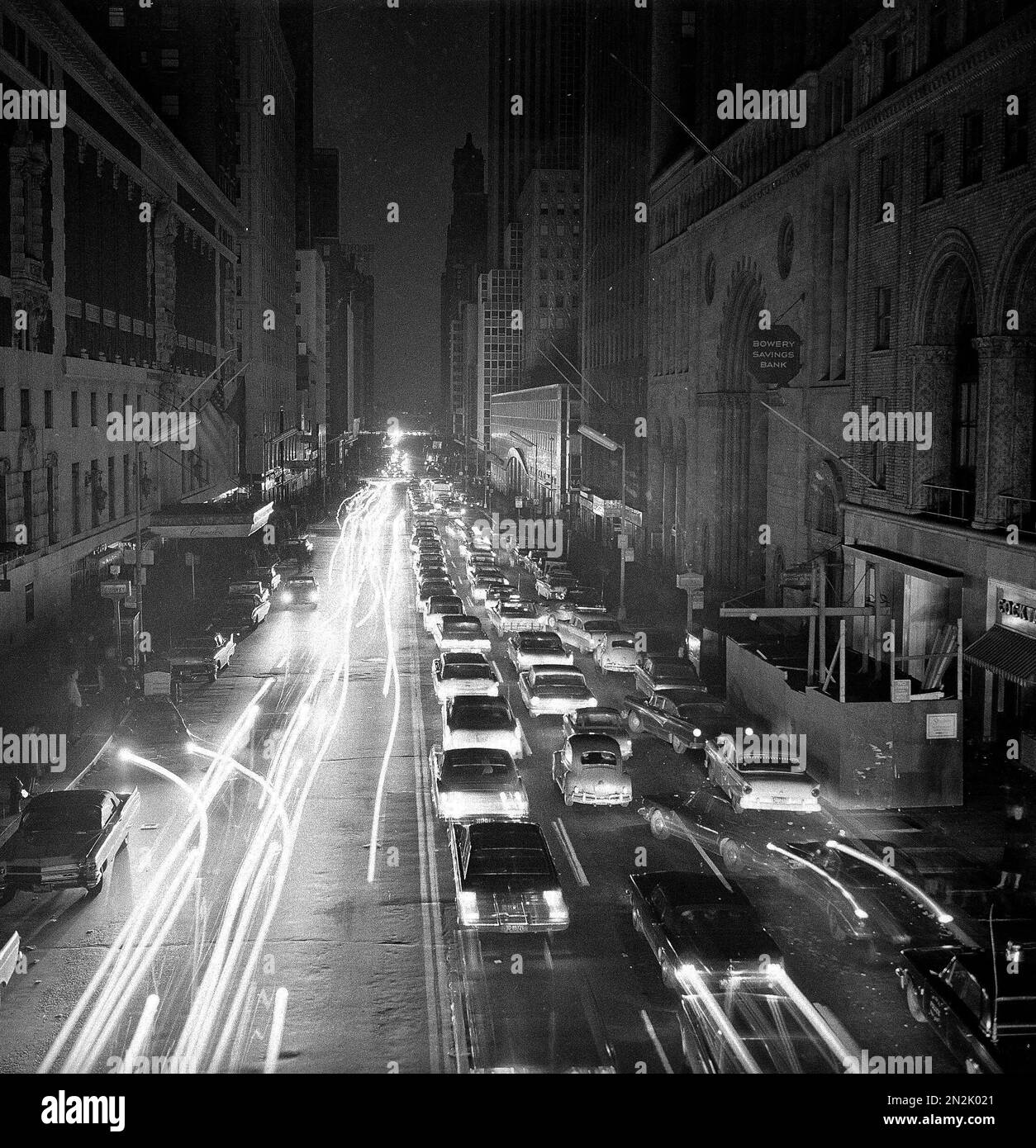 Cars move slowly on 42nd Street in New York, after a massive blackout ...