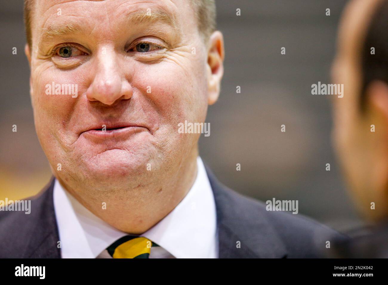 Dave Paulsen speaks to a member of the media following a news ...