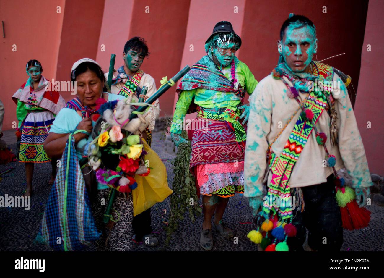 Performers wearing traditional dress from the Huanta district of ...