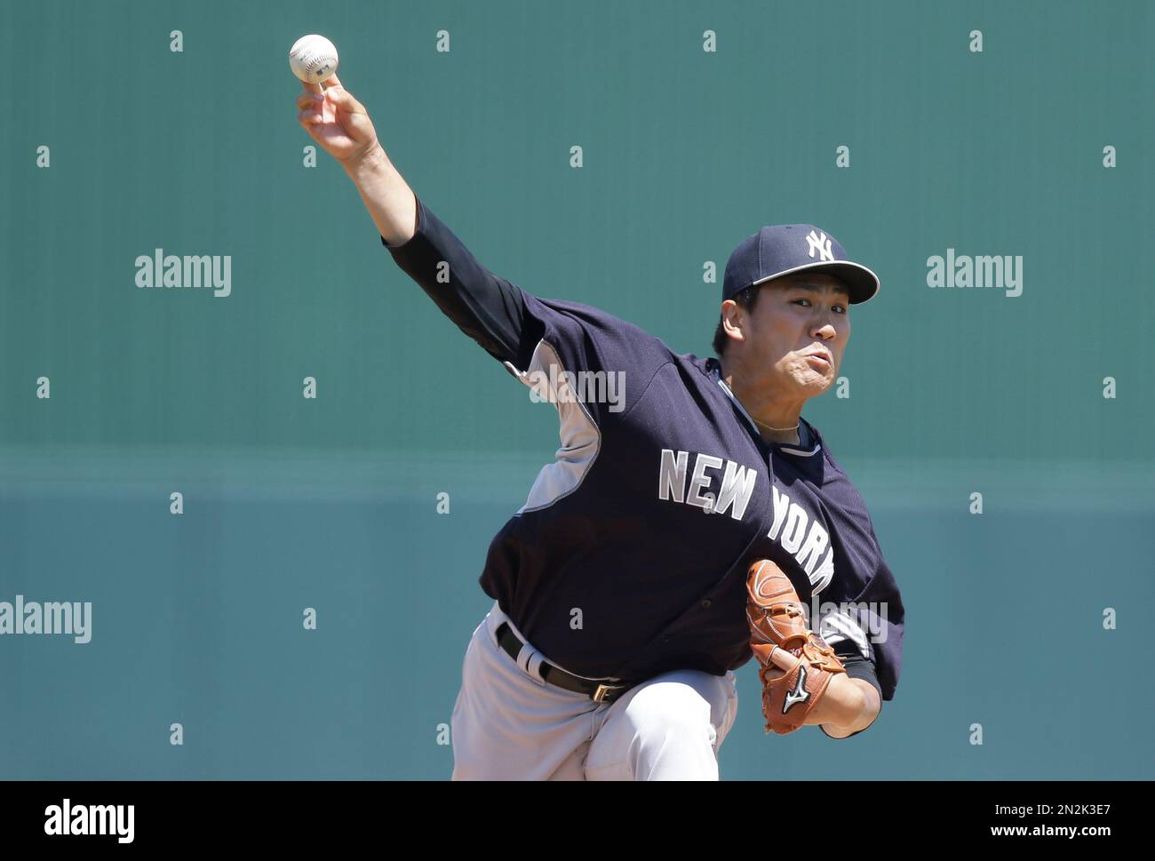 New York Yankees starting pitcher Masahiro Tanaka delivers against the ...