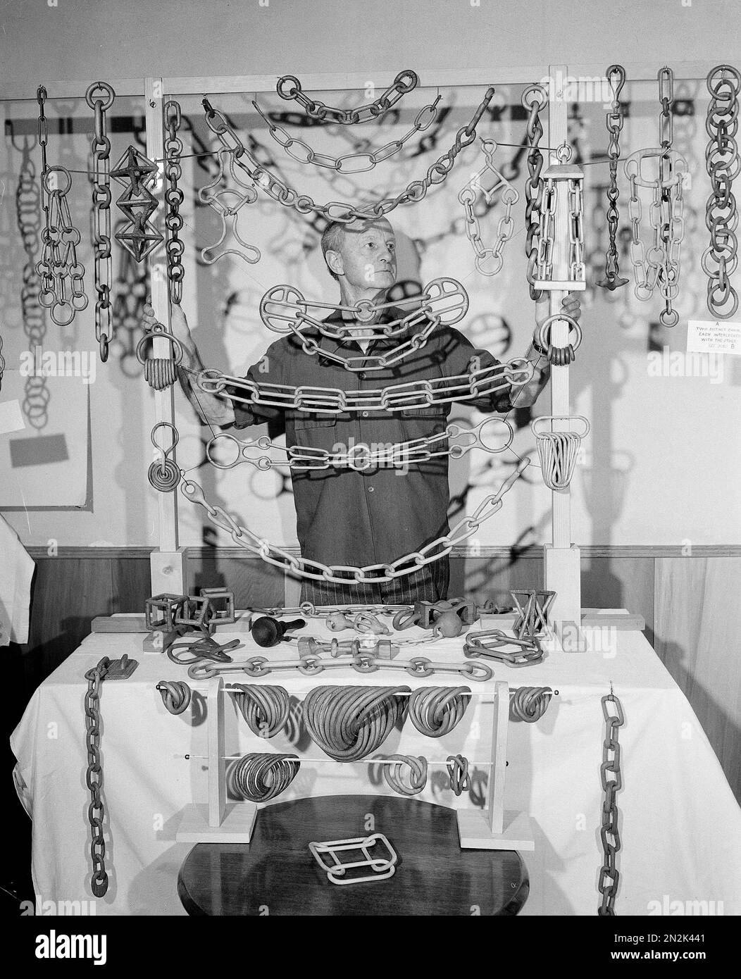 Colonel A.E. Powell is shown with part of his whittled collection which ...