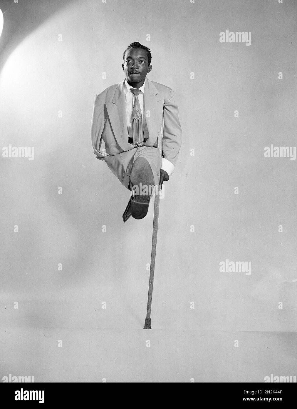 Crip Heard, one-armed and one-legged acrobatic and tap dancer, shown in ...