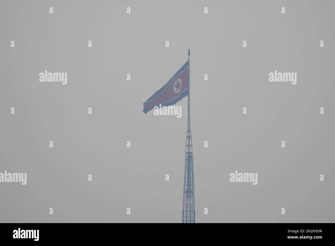 A North Korean flag flutters in the wind atop a 160-meter tower in ...